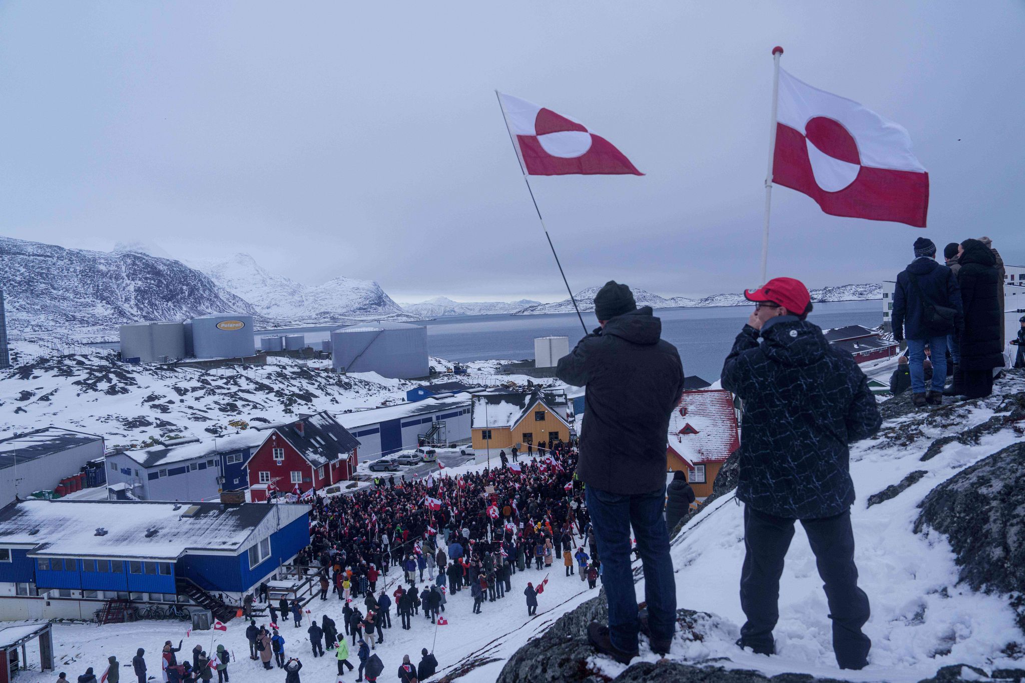 Photos show Greenlanders brave near-freezing temperatures to march ...