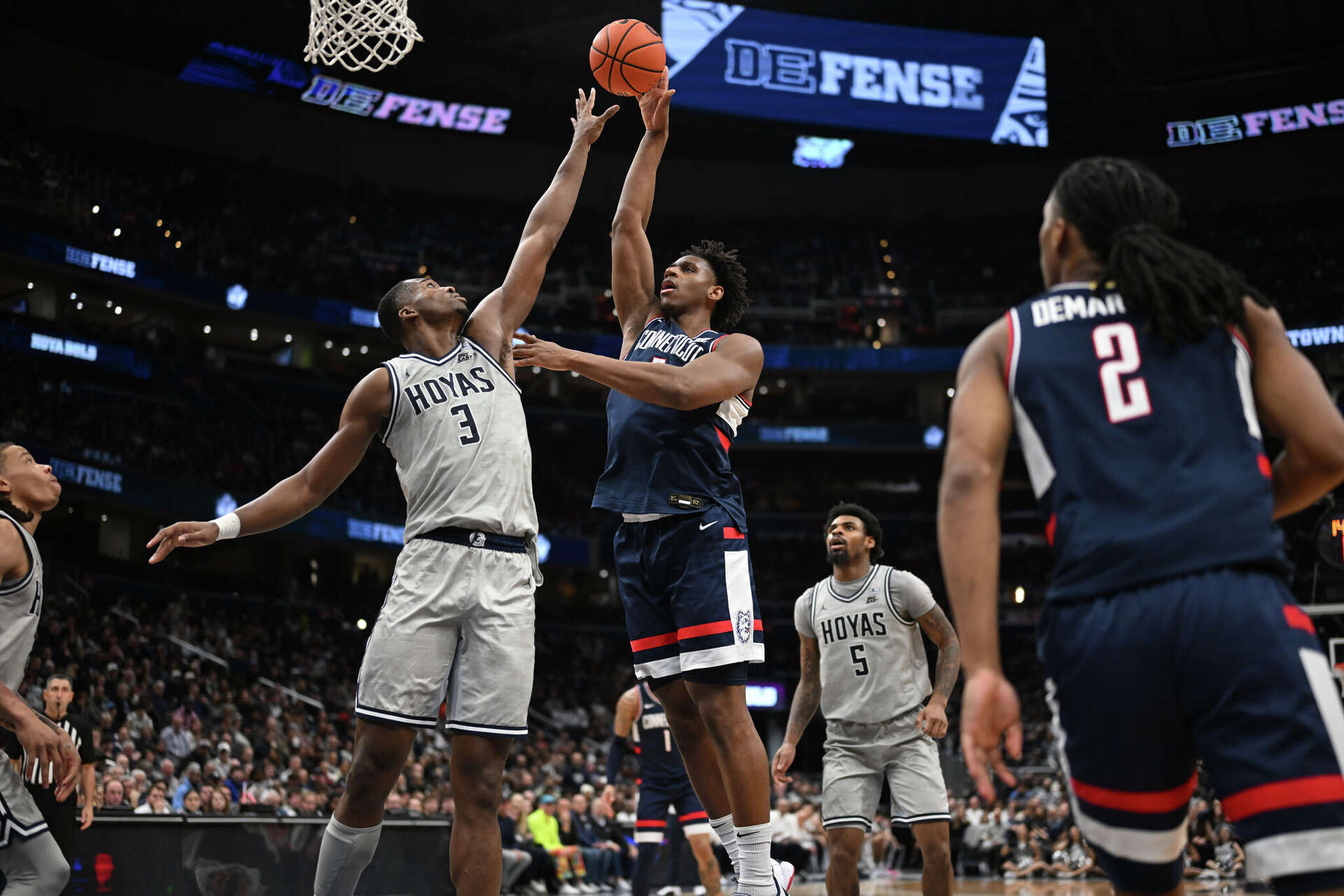 UConn men's basketball survives poor foul shooting, edges Georgetown.