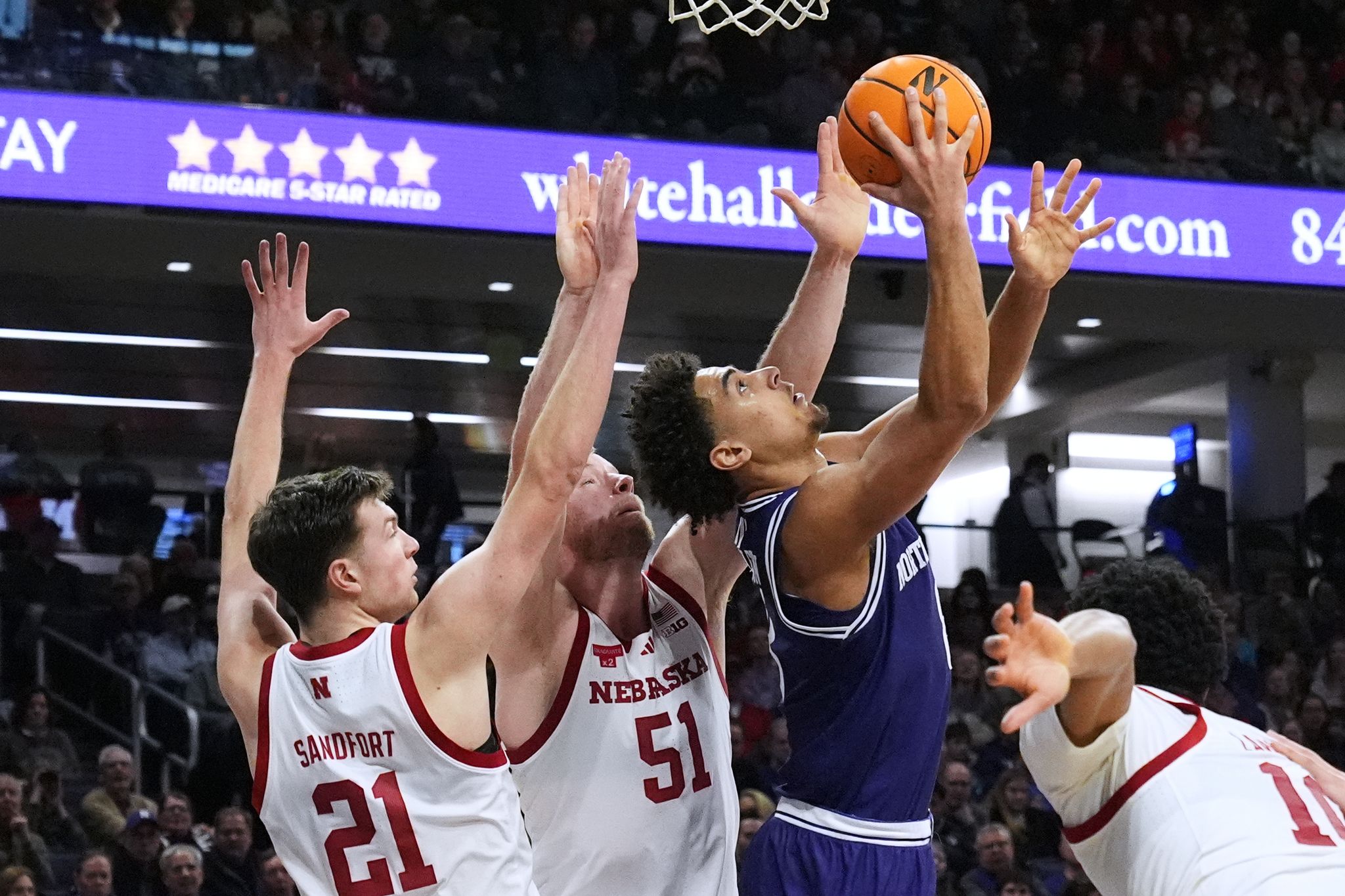 No. 8 Nebraska stays unbeaten with a dominant 77-58 win over Northwestern
