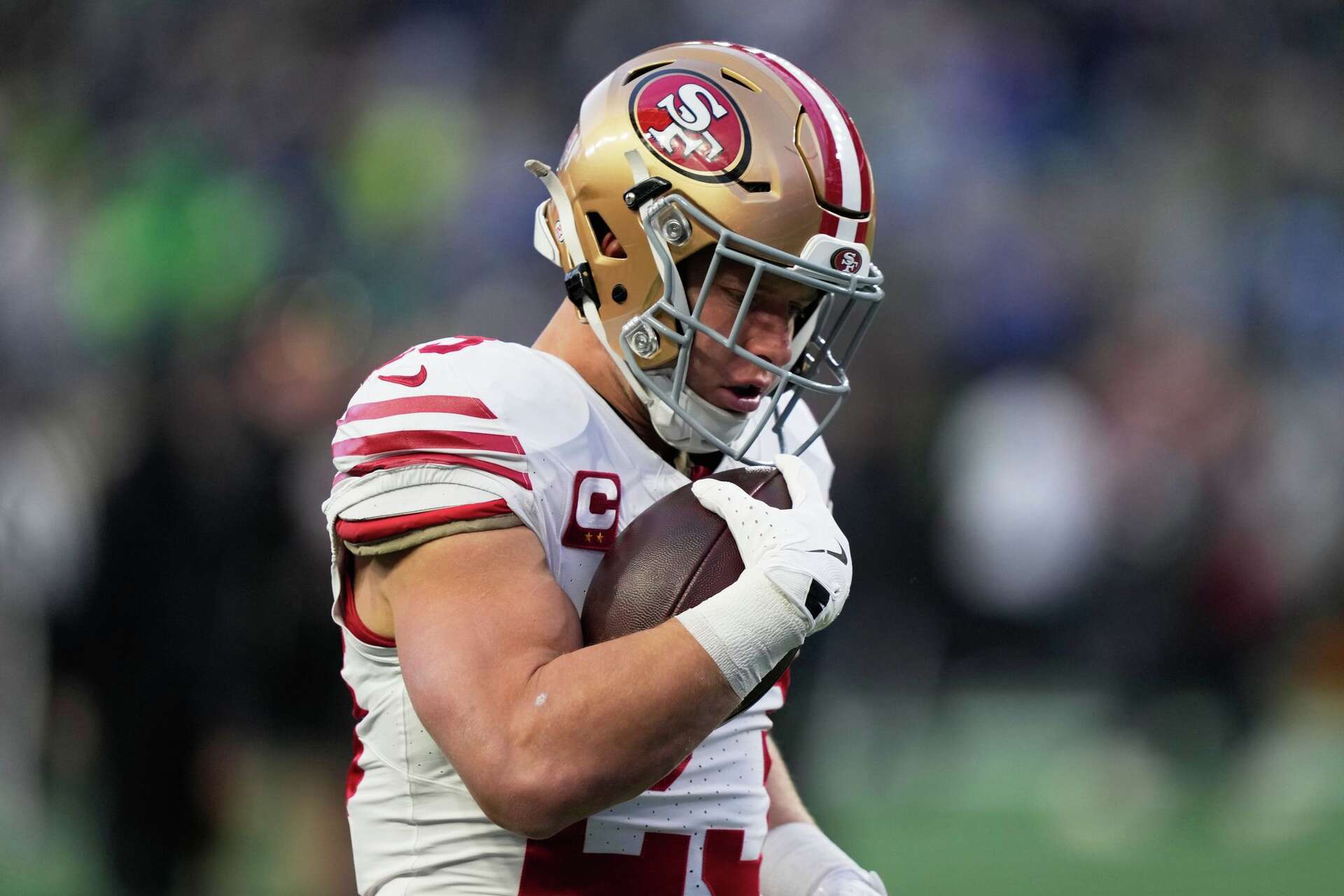 49ers star RB Christian McCaffrey injured in playoff game against ...