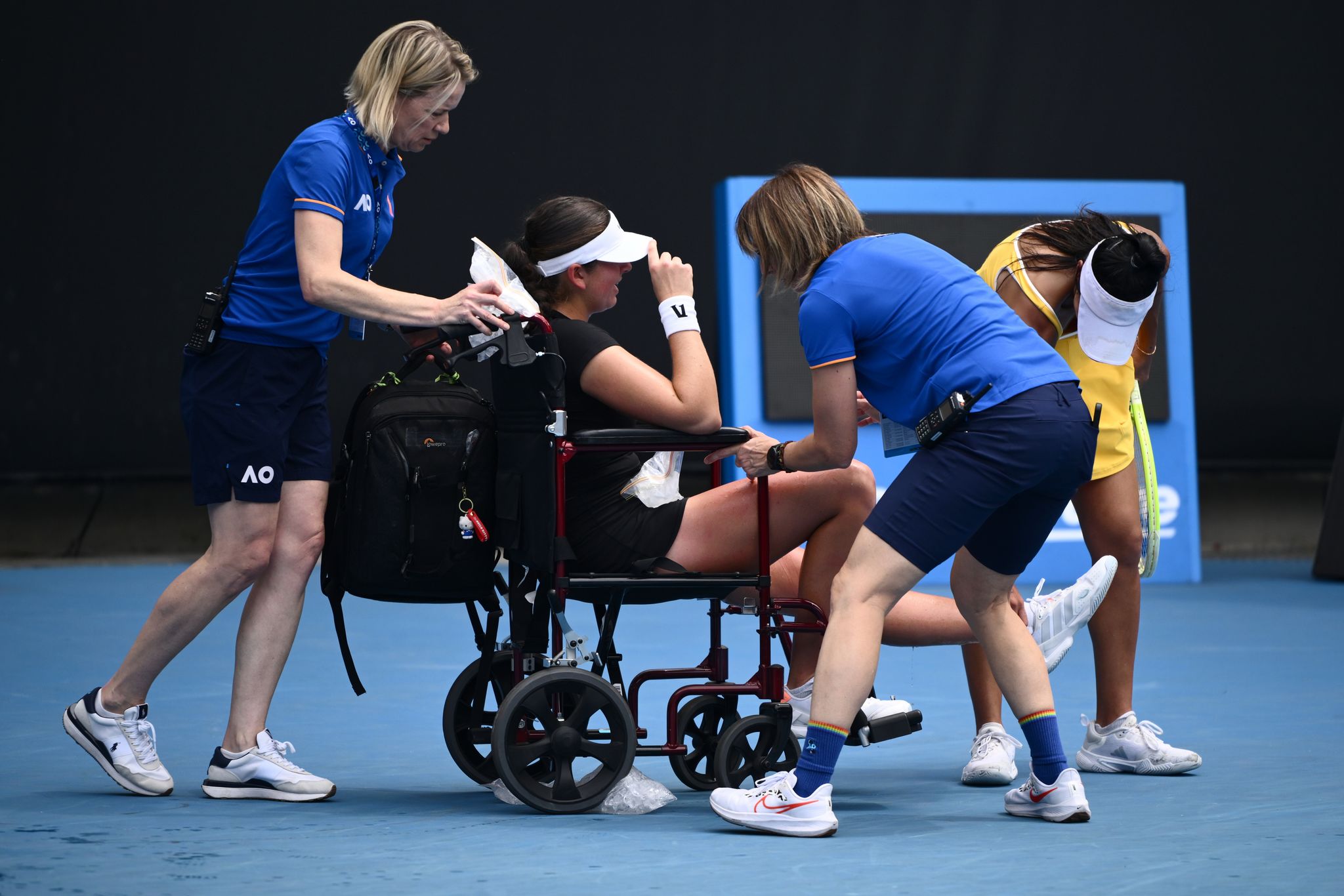 Canada's Stakusic leaves court in a wheelchair as Australian Open warms up