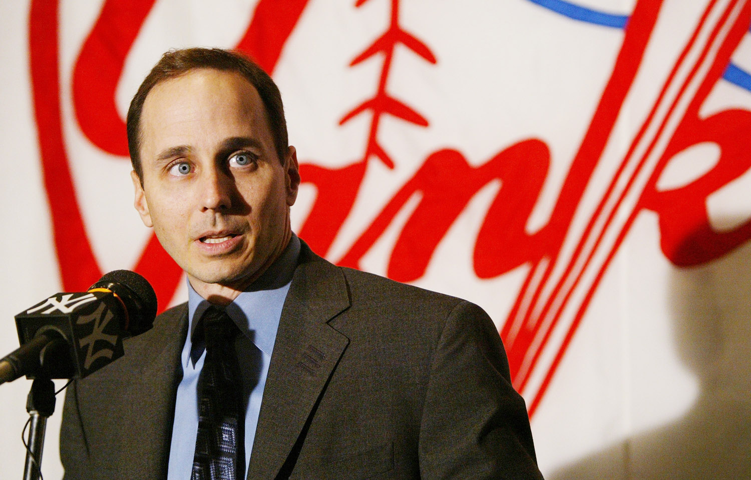 Woman charged with stalking Cashman