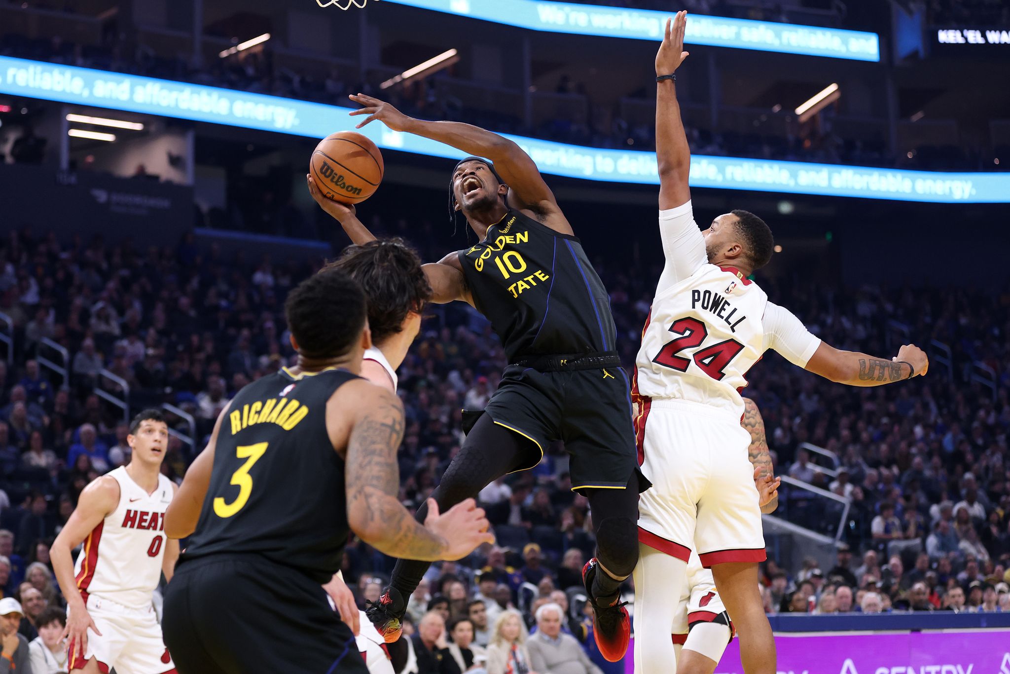 Warriors’ Jimmy Butler leaves game after suffering right knee injury