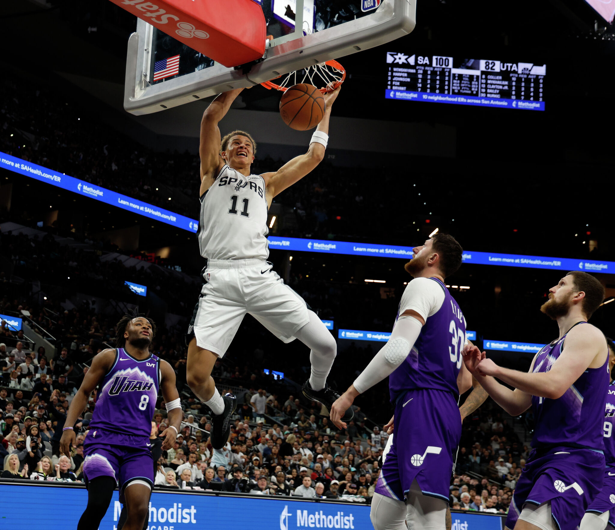 Spurs' Carter Bryant keeps dunking, even with a price on his head