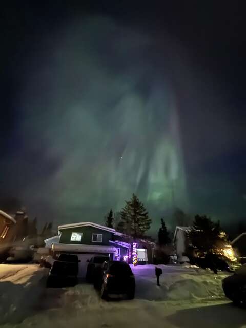 Aurora lights up Alaska skies with stunning green and red display