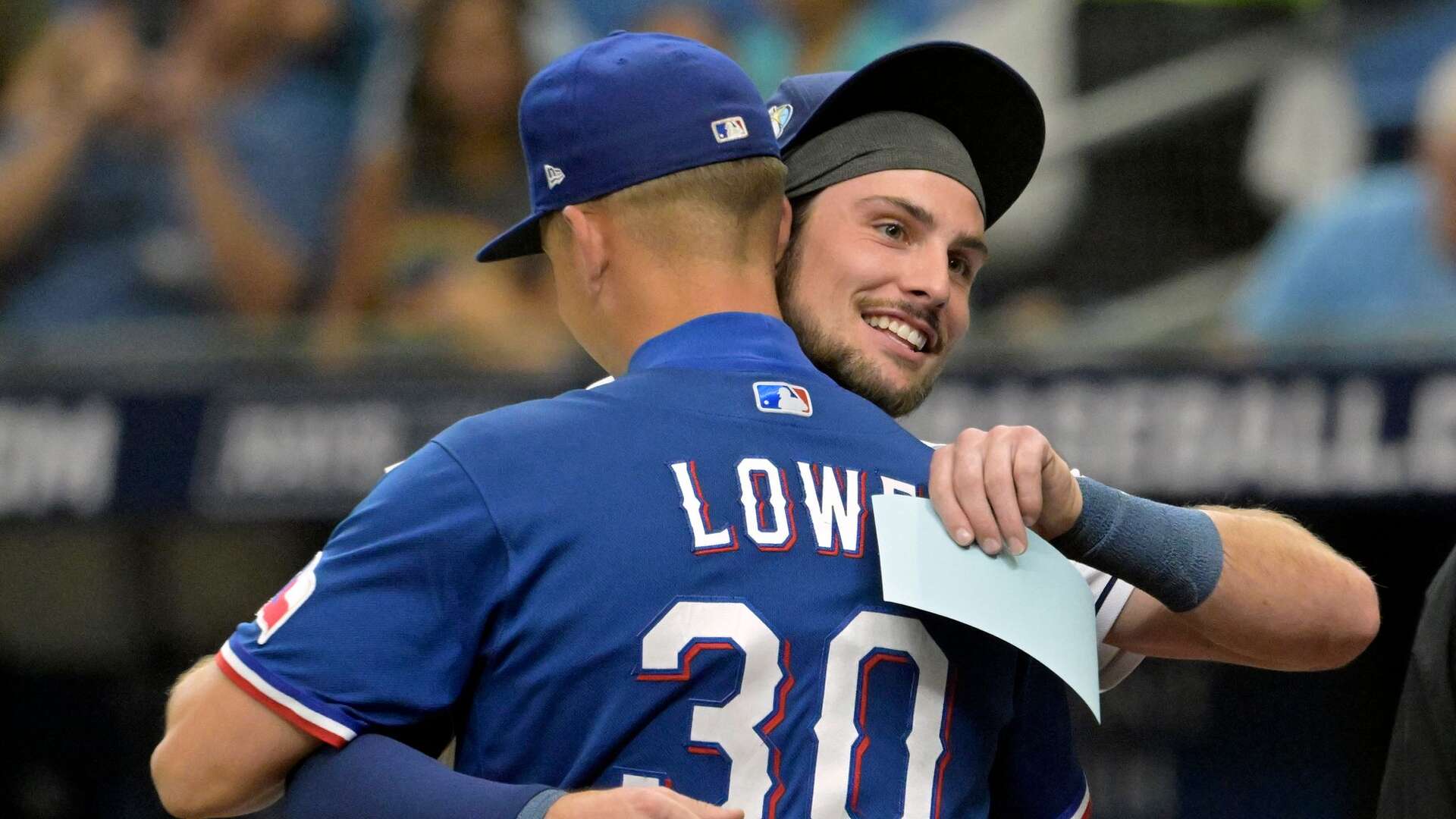 Nathaniel, Josh Lowe share special moment before Rangers-Rays game