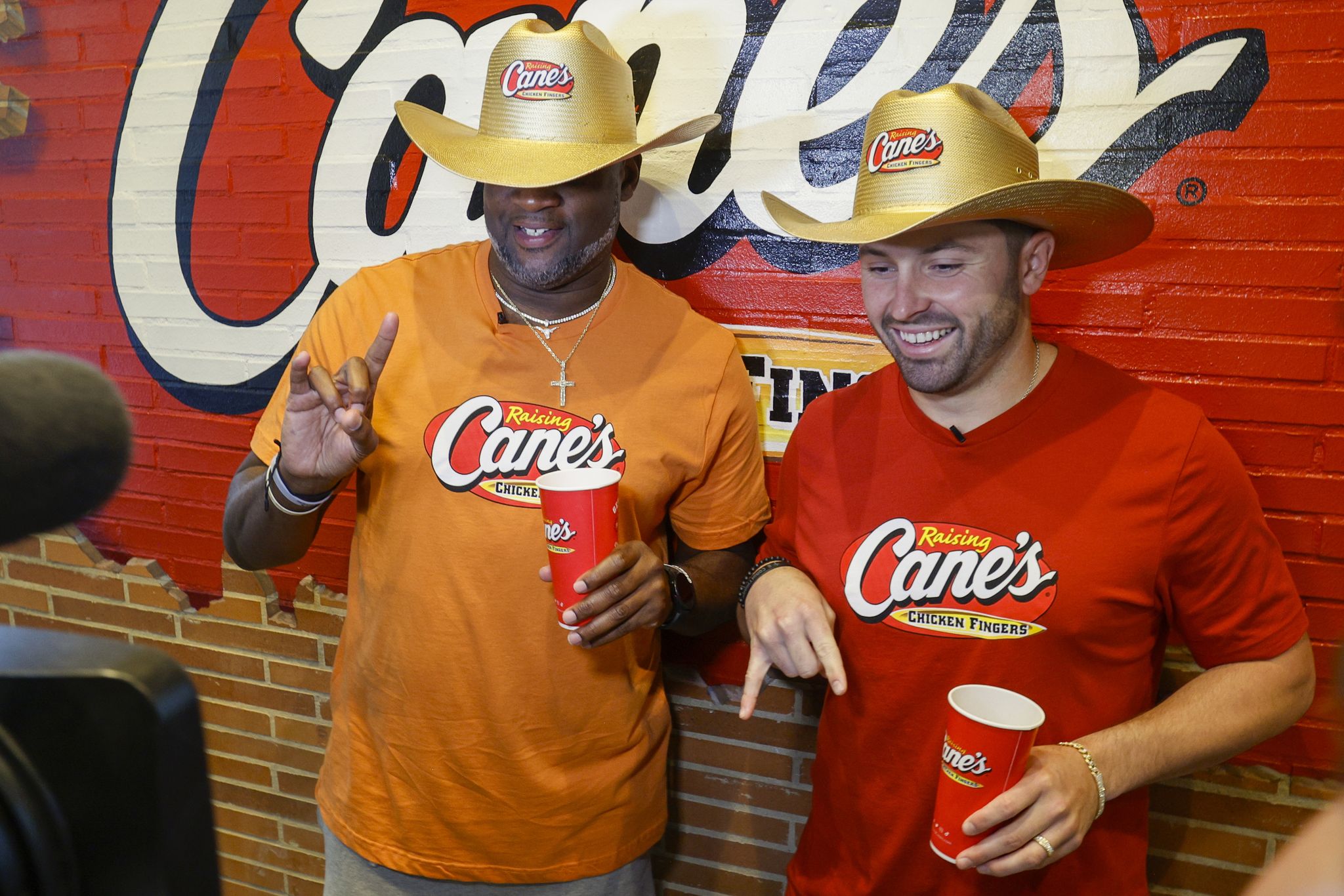 Photos: Ex-Texas and Oklahoma QBs Vince Young, Baker Mayfield serve ...