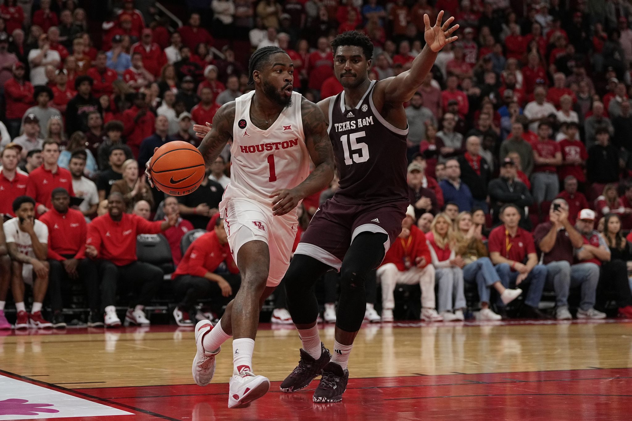 Emanuel Sharp, No. 4 Houston hold off Texas A&M