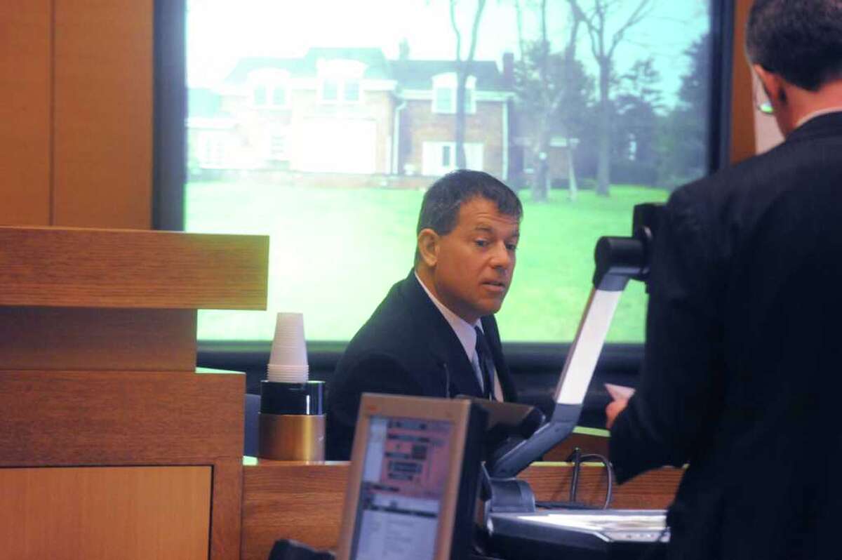 Grisly photos shown, police testify at Kissel trial