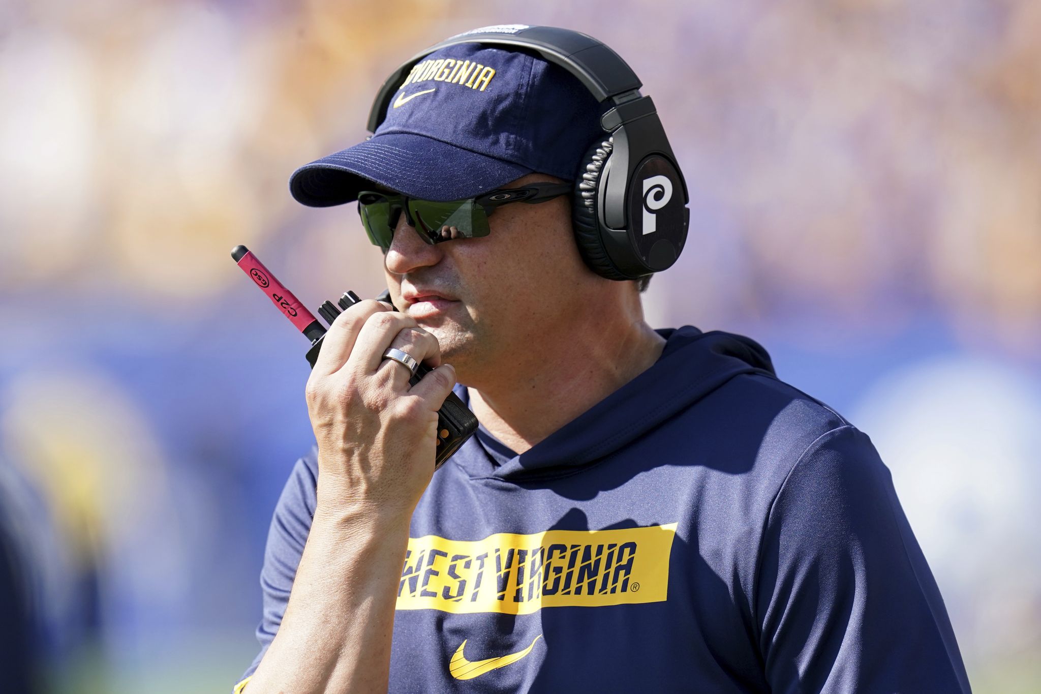 Report: Texas hires former West Virginia head coach Neal Brown