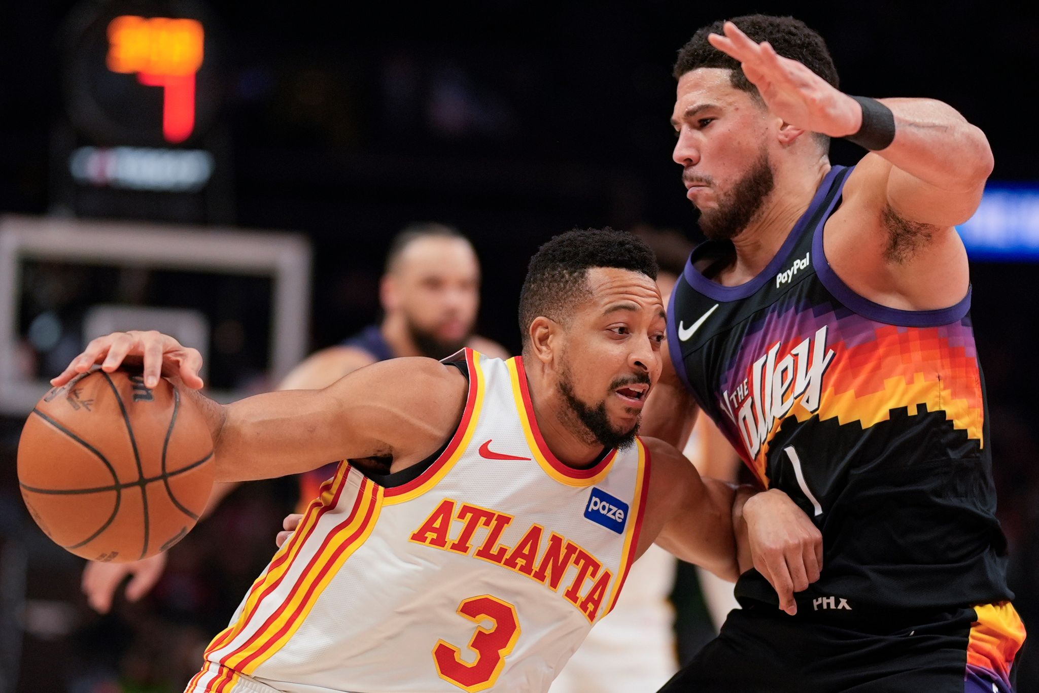 Hawks rally to beat Suns 110-103 after Phoenix loses Devin Booker to injury