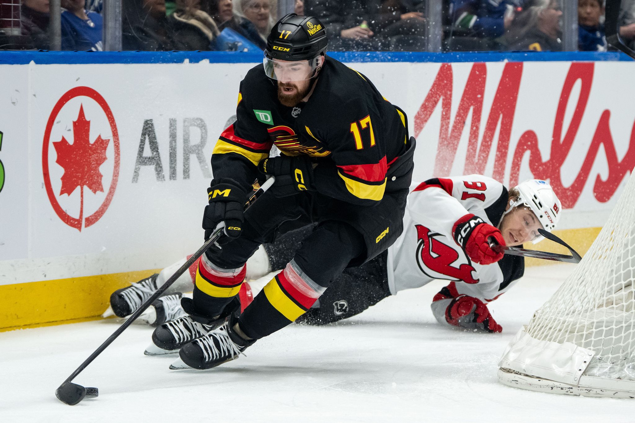 Cody Glass has 2 goals and an assist in Devils' 5-4 win over Canucks