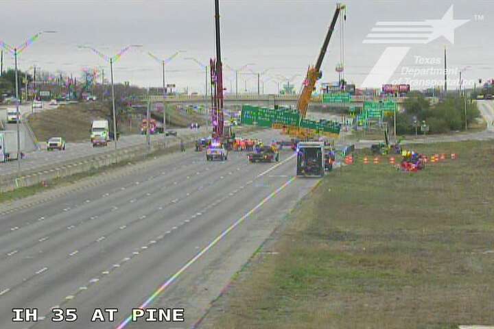 San Antonio highway closed after vehicle hits overhead signs