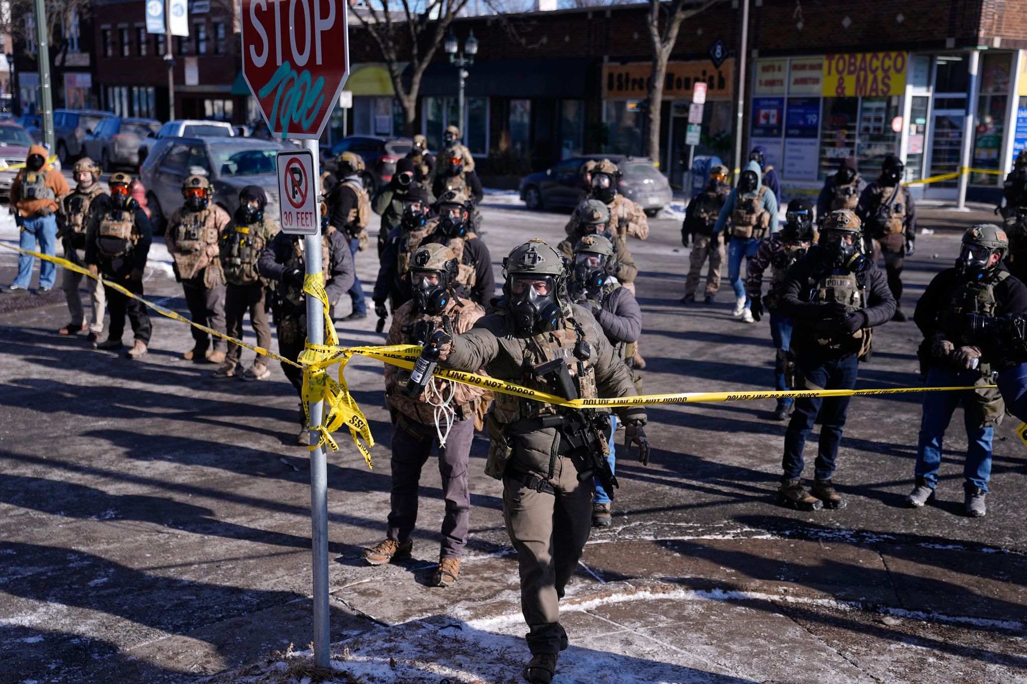 Officers react with crowd after man was killed in Minneapolis amid ...