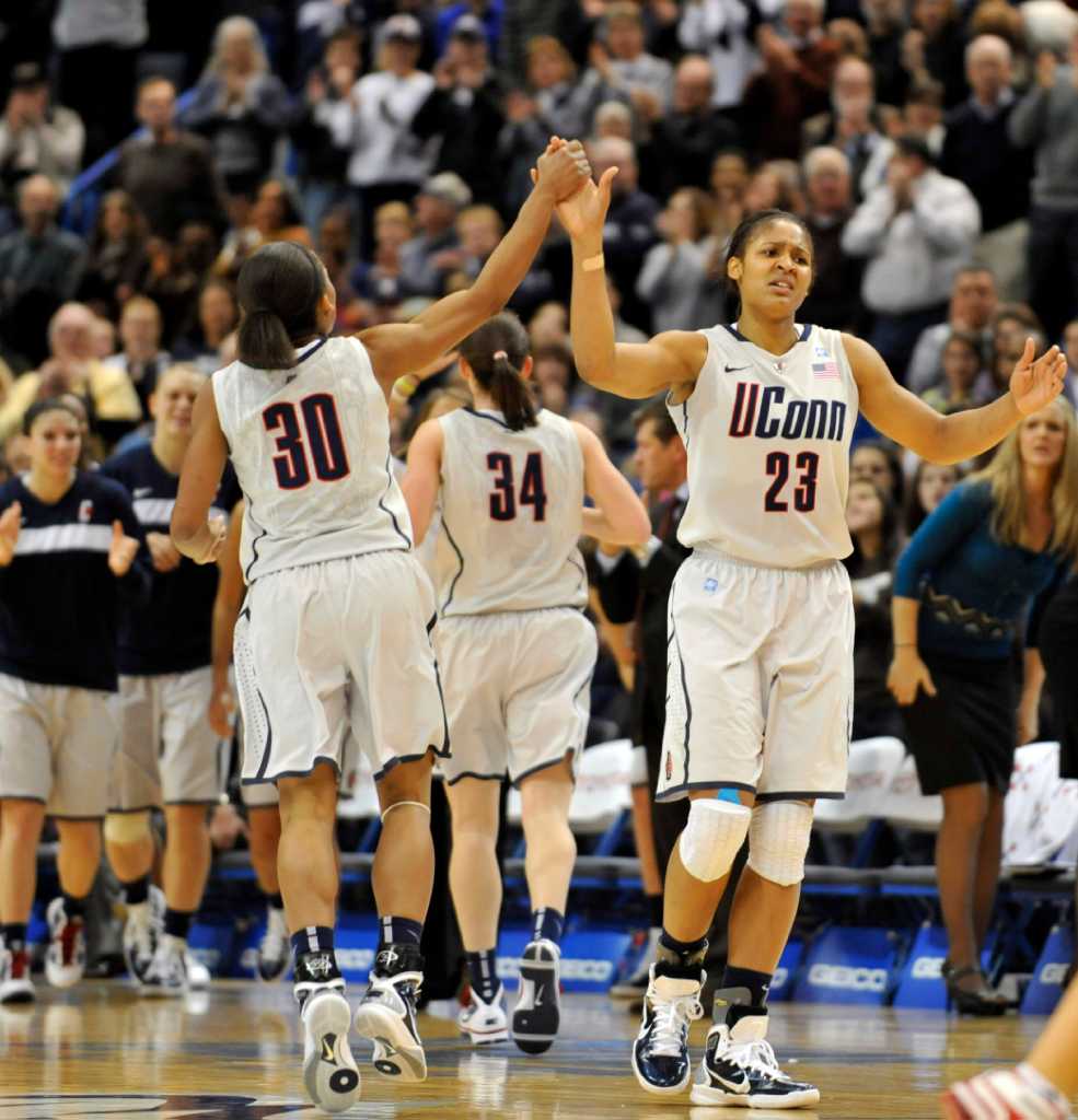 Moore becomes Huskies' all-time leading scorer