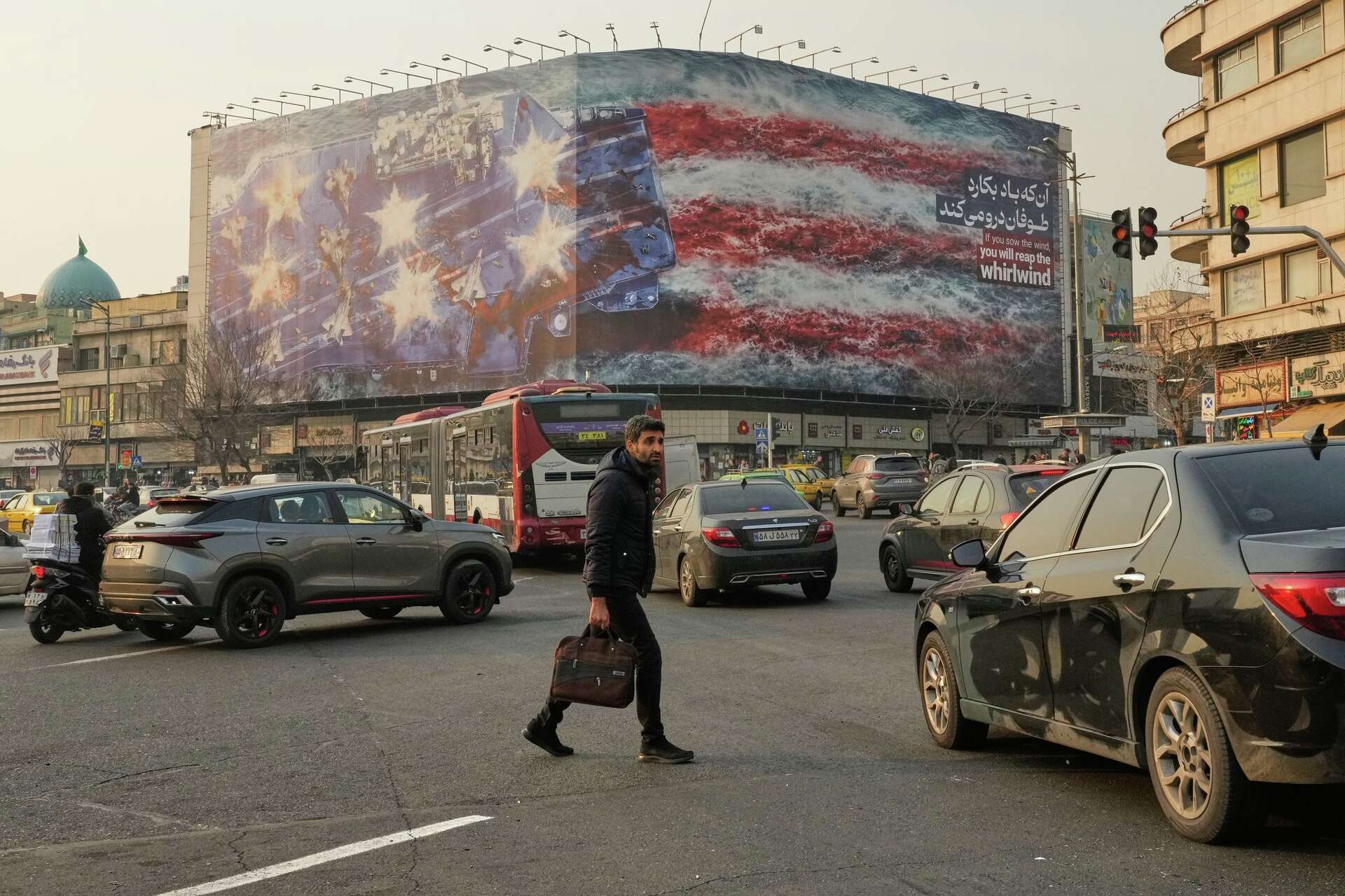 Iran unveils mural warning of retaliation if US conducts a military strike