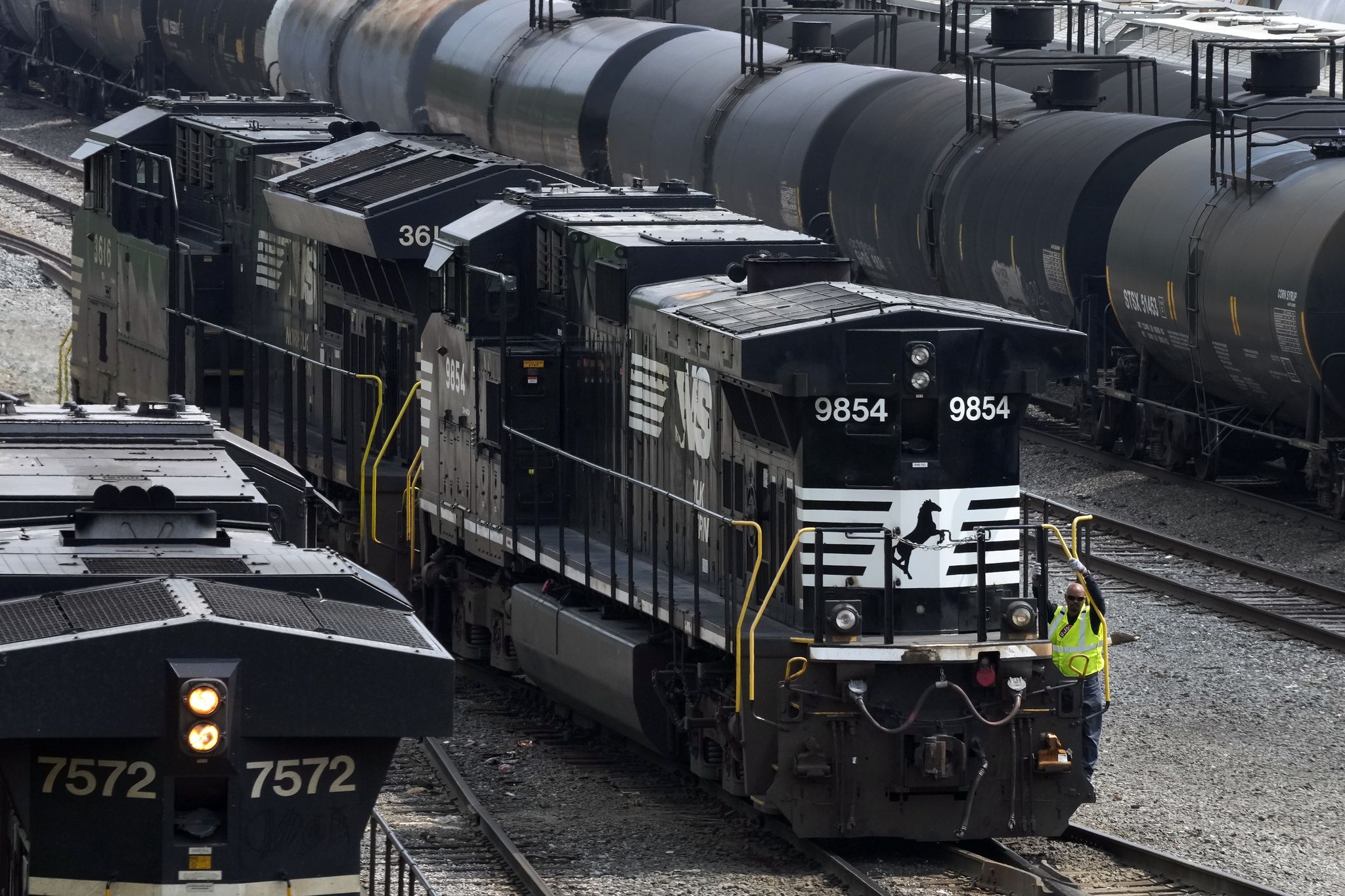 Why do trains blast horns near Garland's quiet zones signs?