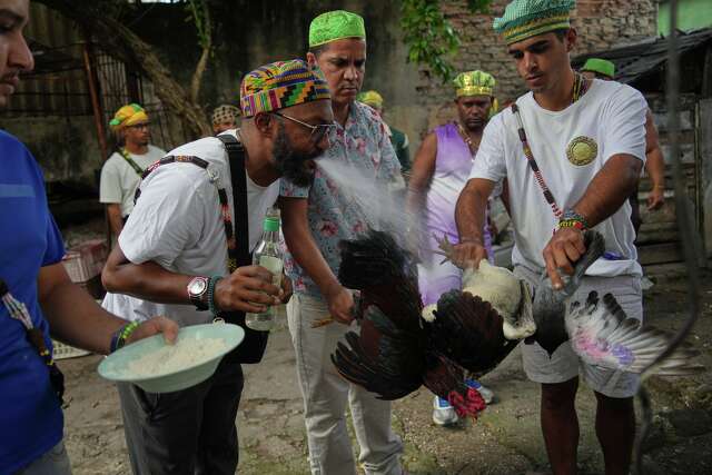Cuba's Santeros offer gifts and ask deities for peace as tensions rise ...