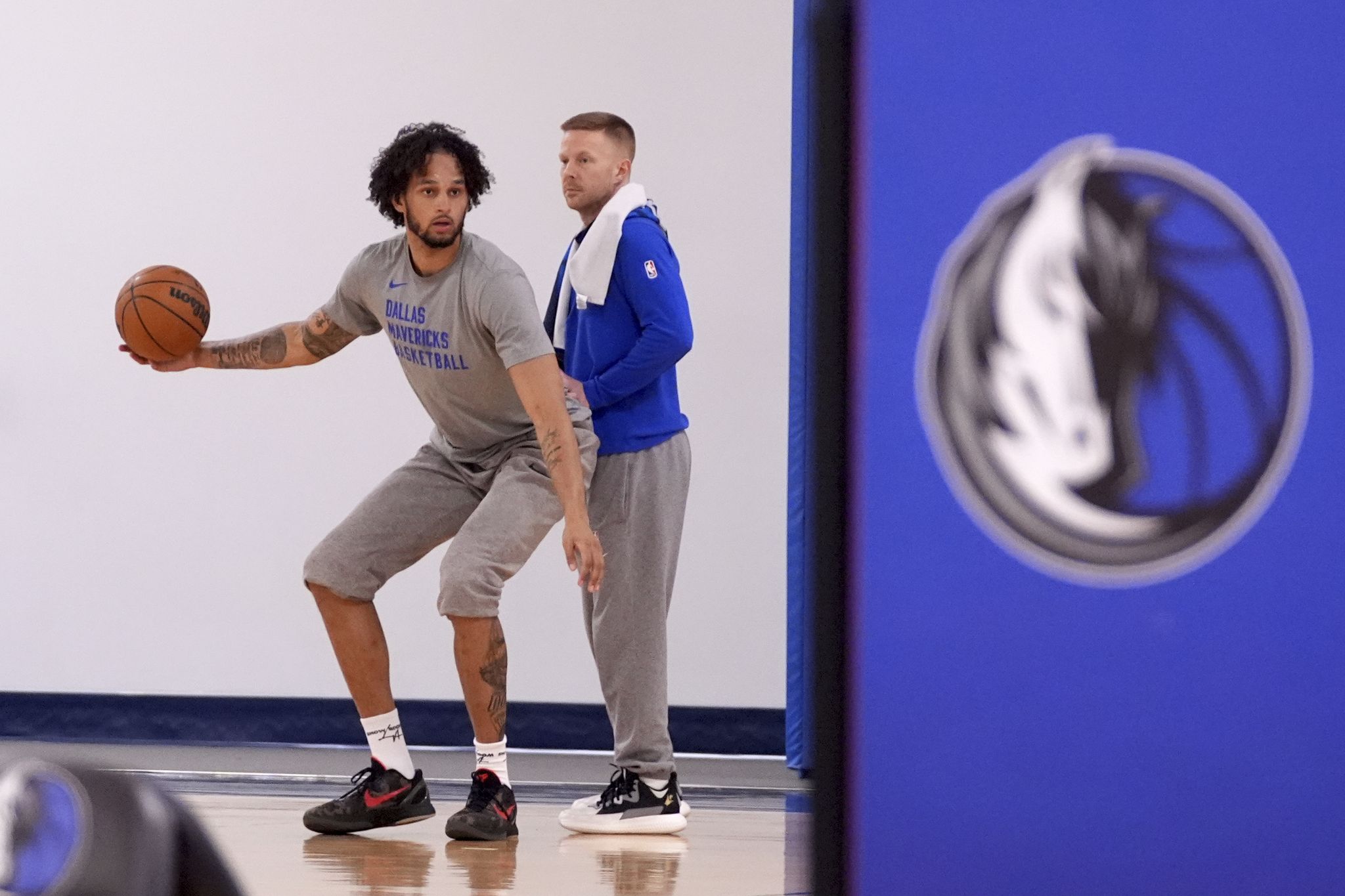 Former Mavericks coach Sean Sweeney was Spurs' ace in the hole