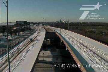 Major Texas highways coated in sleet, ice in Austin