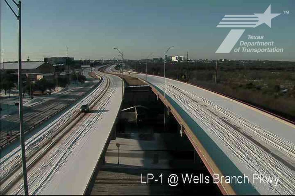 Major Texas highways coated in sleet, ice in Austin