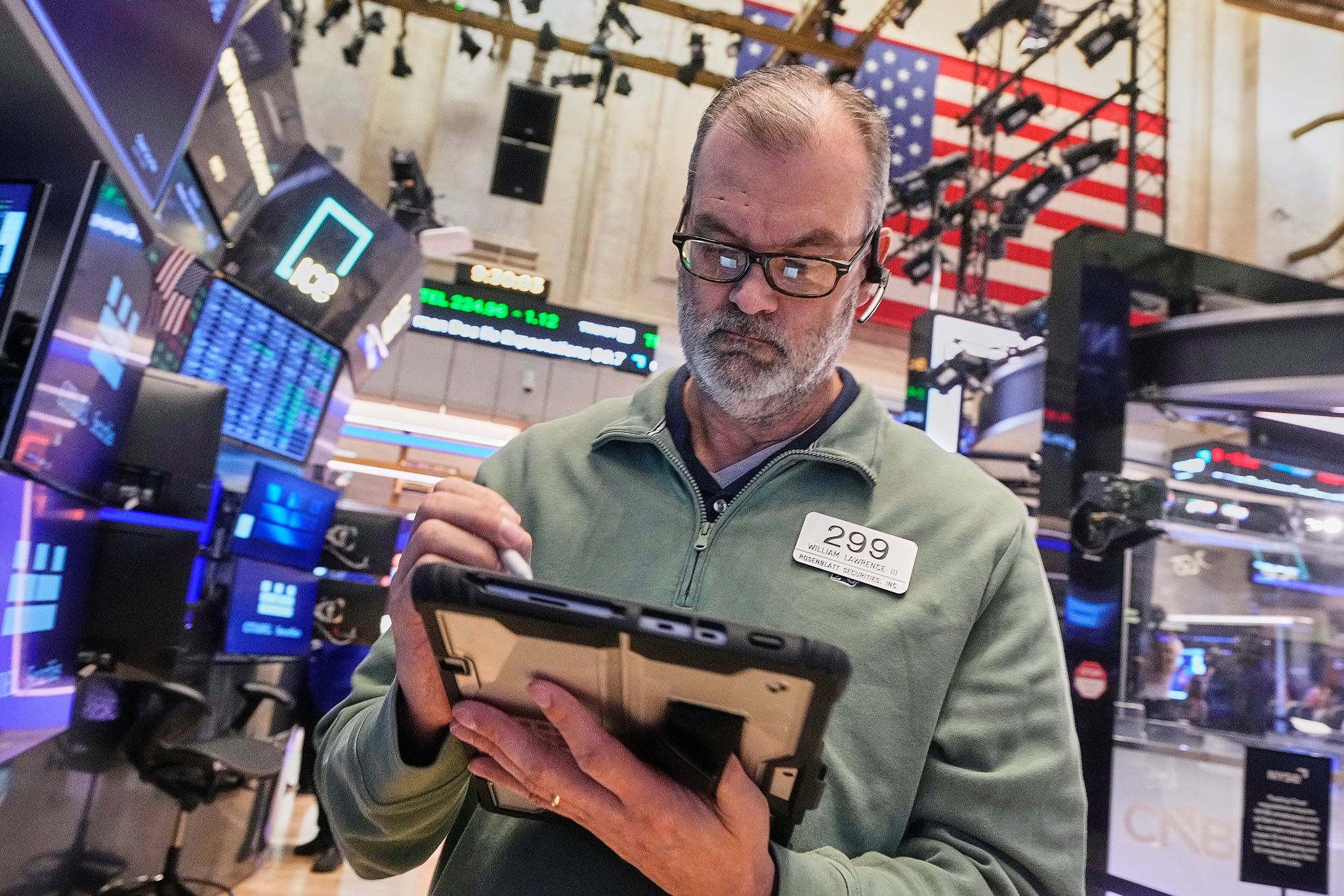 After a day of sharp swings, Wall Street ends nearly where it began