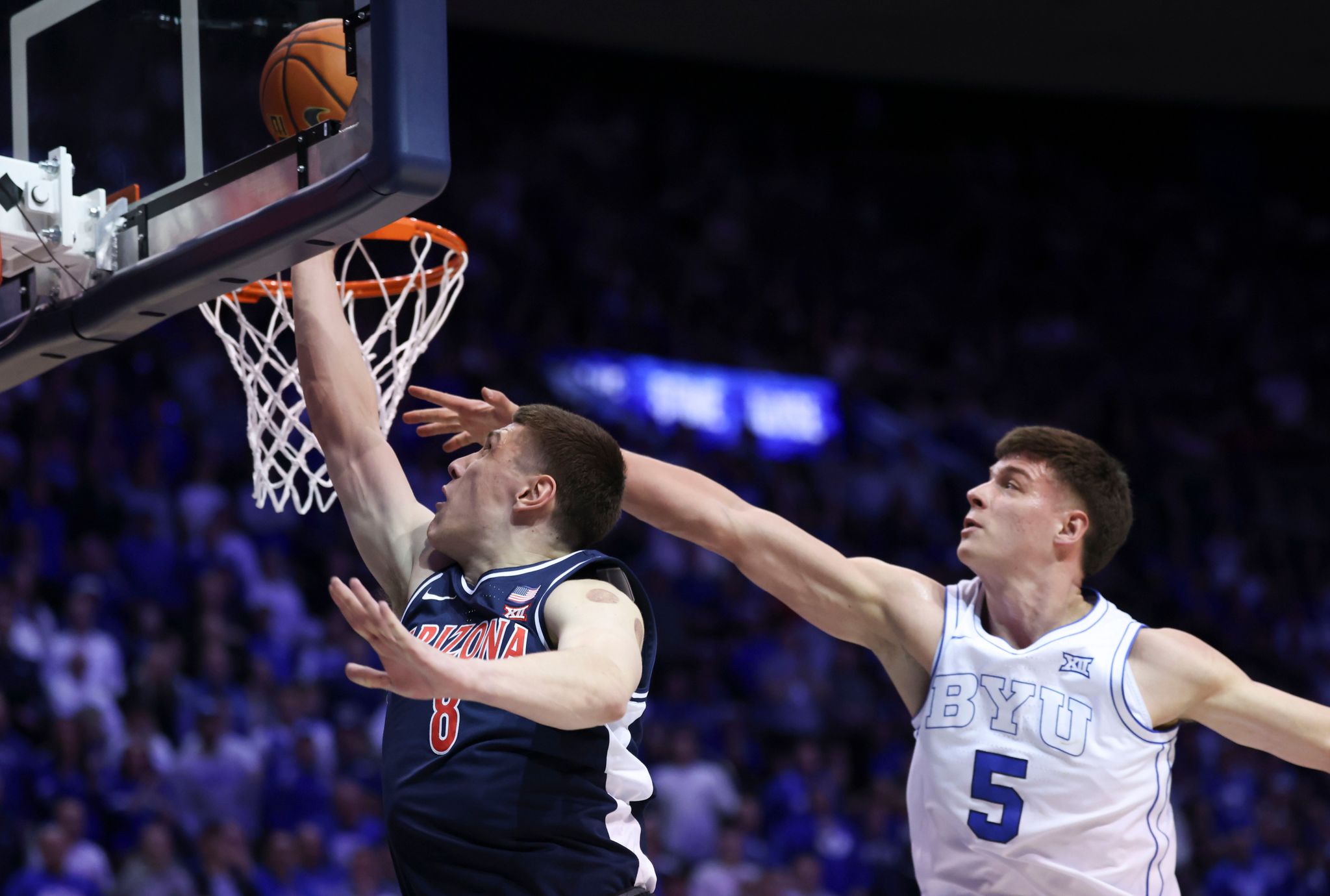 Top-ranked Arizona withstands late rally by No. 13 BYU to remain ...