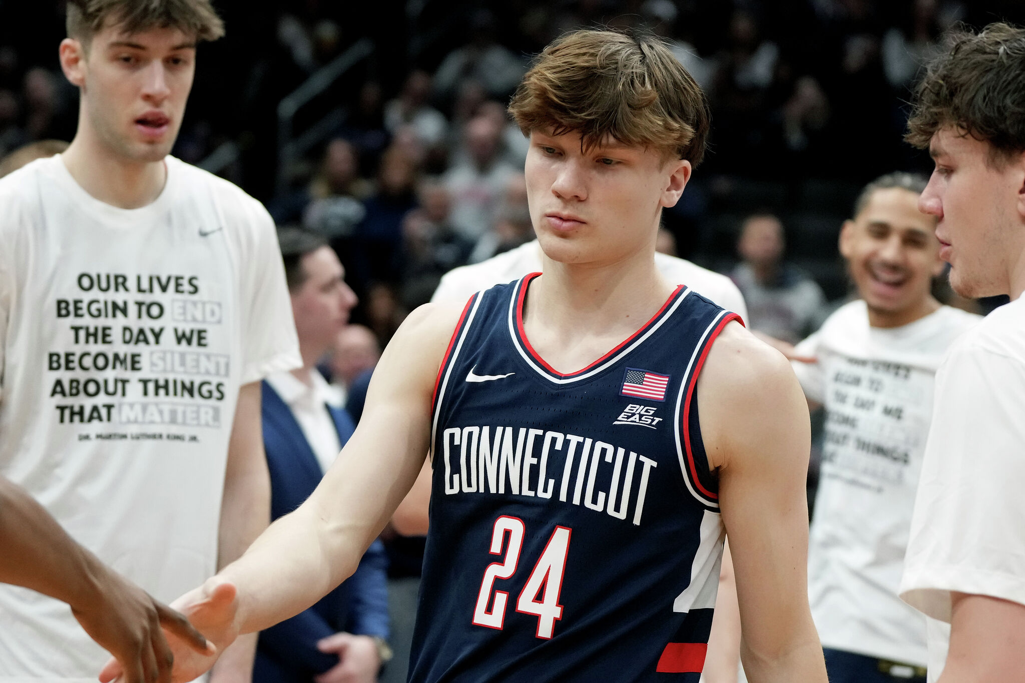 Celebrini's 4 points lead Sharks to 5-2 win over Canucks