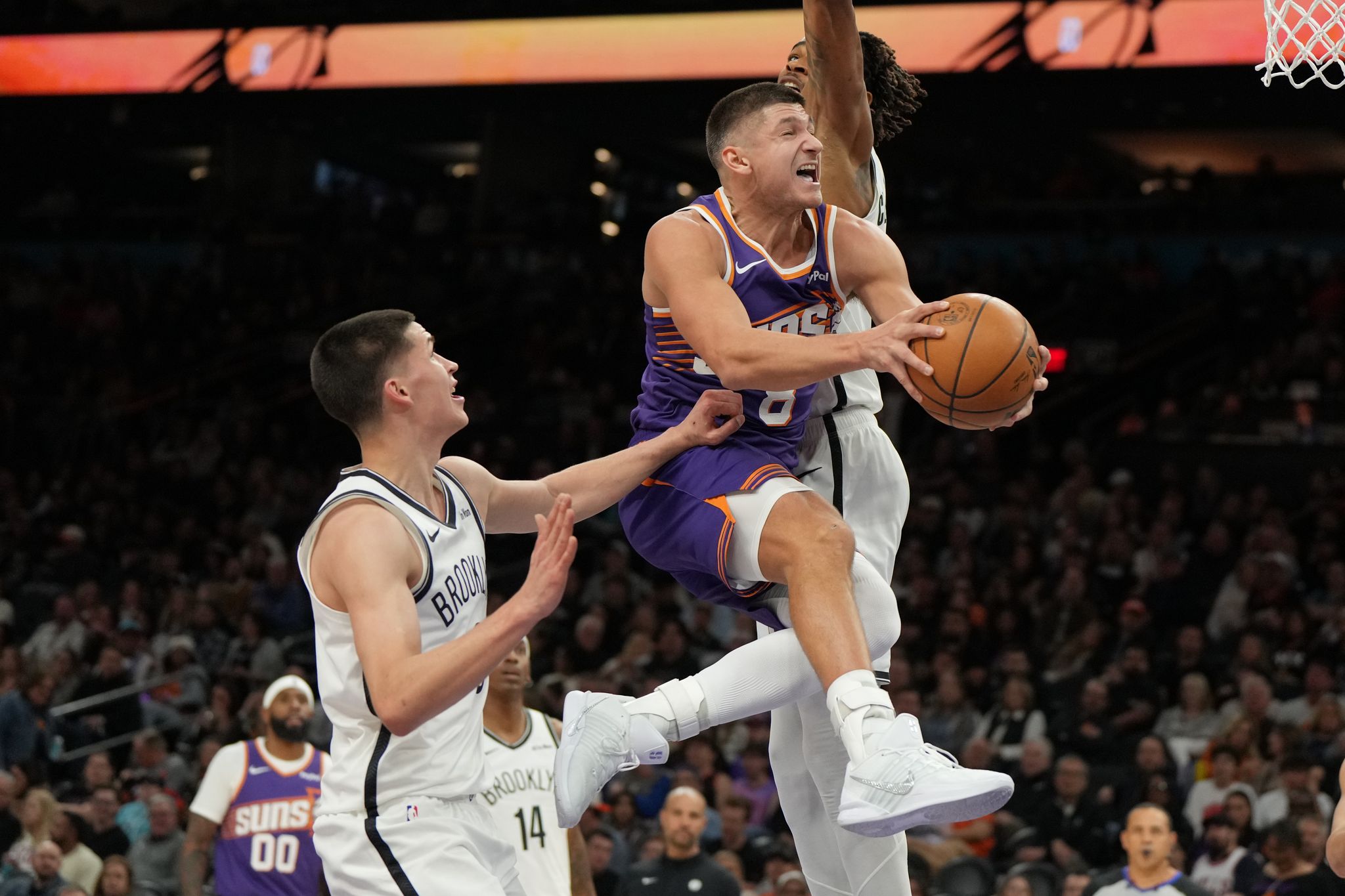 Suns beat Nets 106-102 after teams scuffle late in fourth quarter