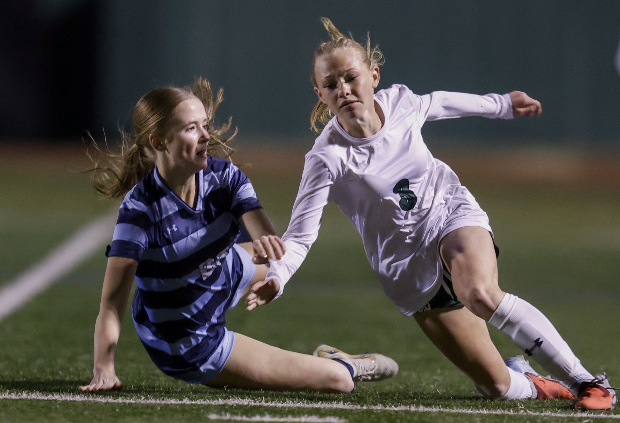 Johnson, Reagan girls play to draw to stay atop District 27-6A
