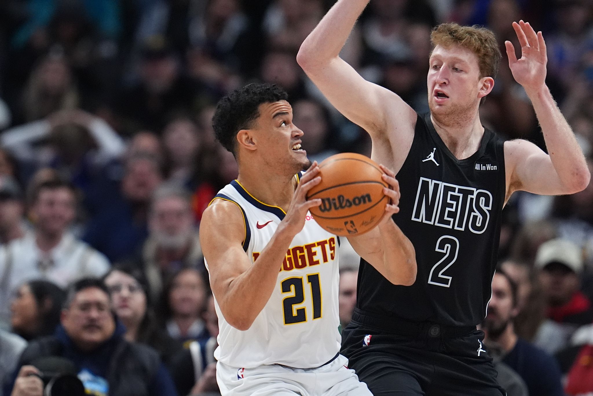 Murray scores 27, Nuggets beat Nets 107-103 in Porter's return to Denver