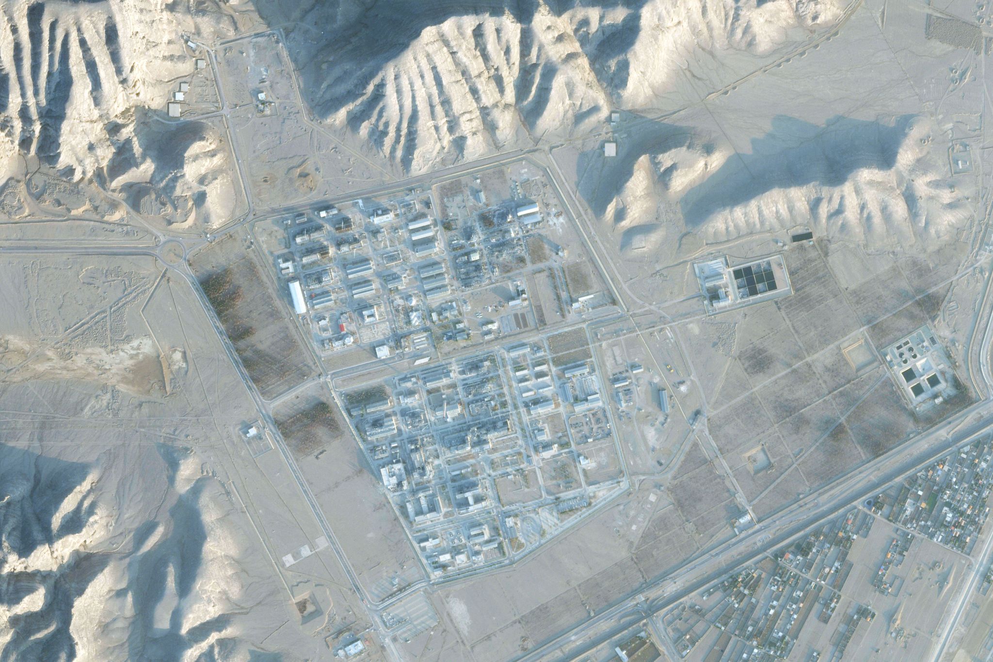Satellite photos show activity at Iran nuclear sites as tensions rise ...