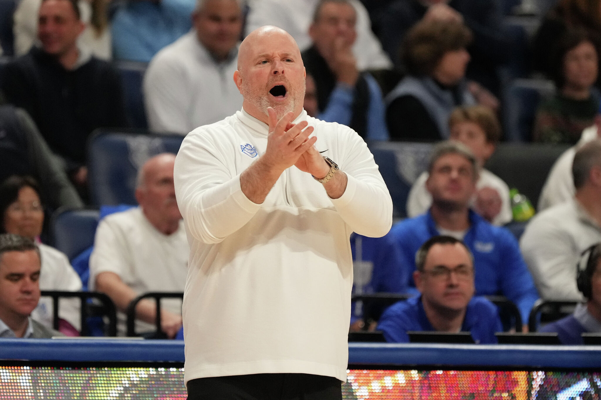 Billikens coach Josh Schertz shares shots at St. Louis bar after win