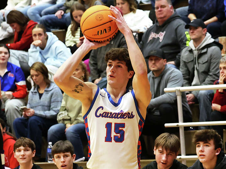 TUESDAY BOYS BASKETBALL: Marquette rallies from 15 down, beats Althoff