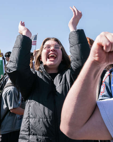 Students protest ICE at Leander High School, see photos from walkout