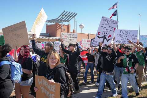 Students protest ICE at Hutto High School, see photos from walkout