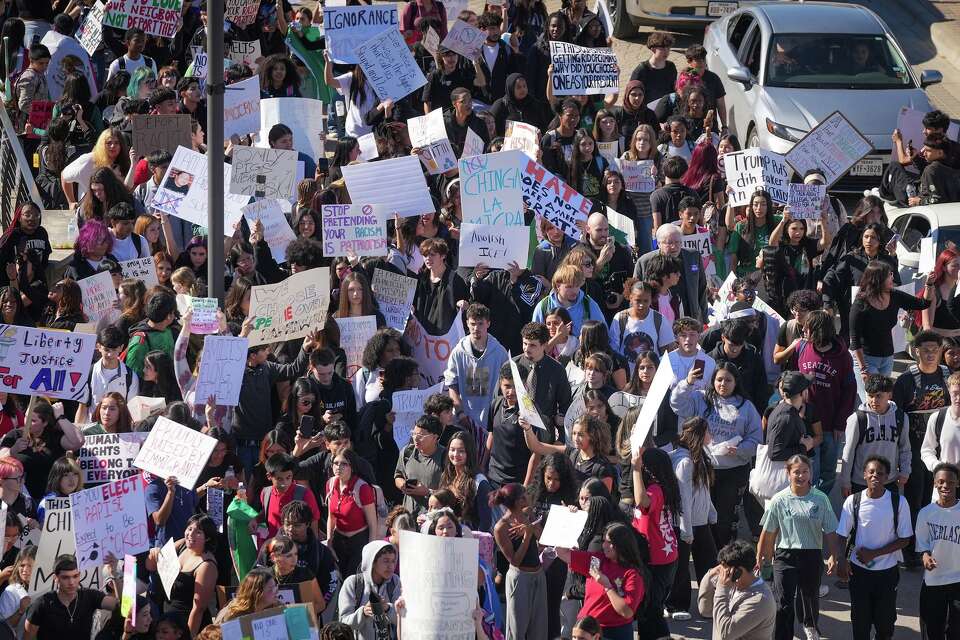 Students protest ICE at Hutto High School, see photos from walkout