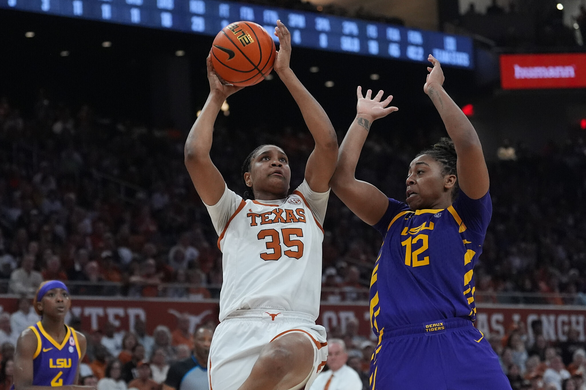 Booker and Crump push No. 4 Texas over No. 5 LSU 77-64 as Longhorns run ...