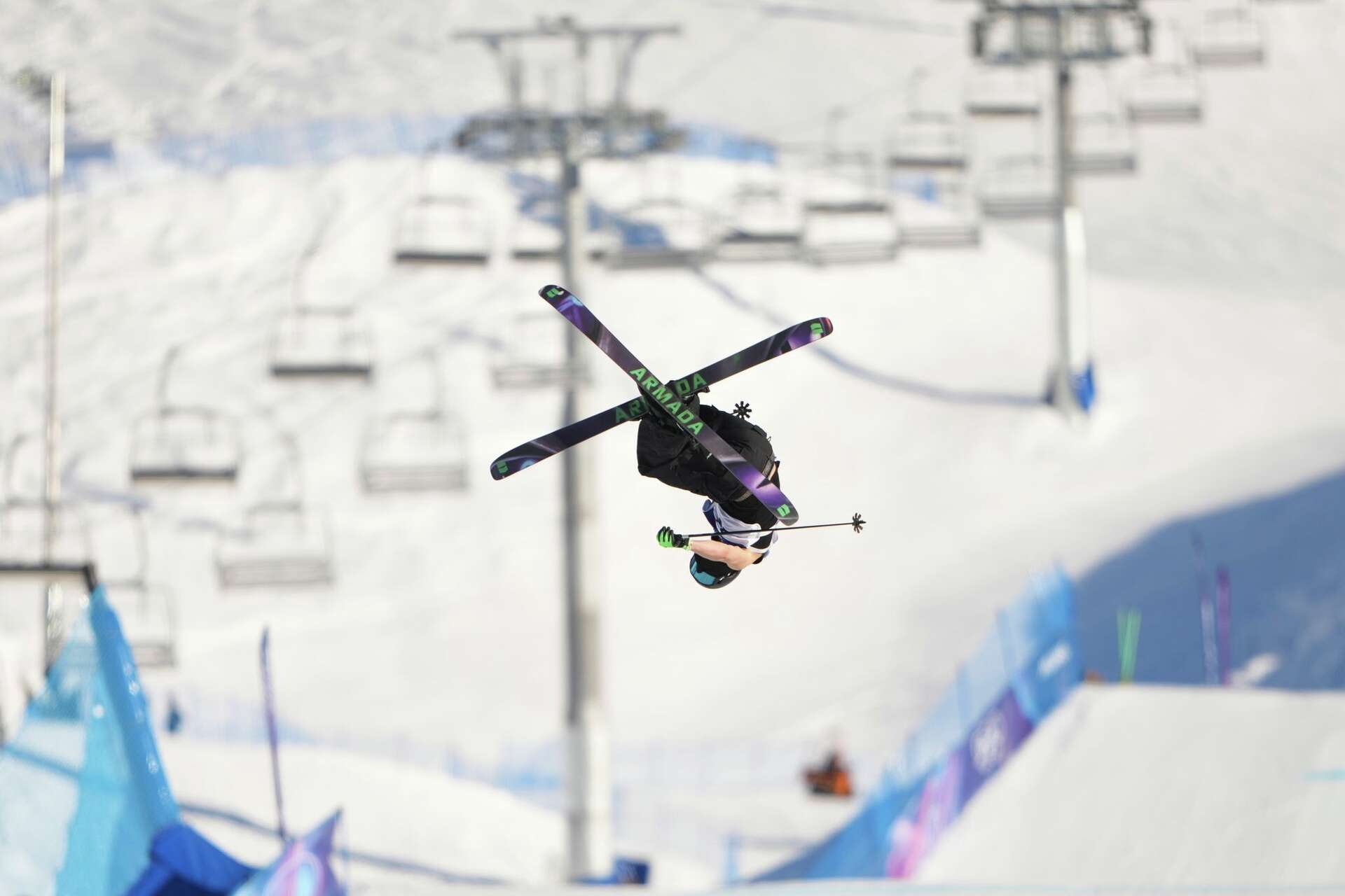 Olympic slopestyler shows some skin, skis down the mountain in a tank top