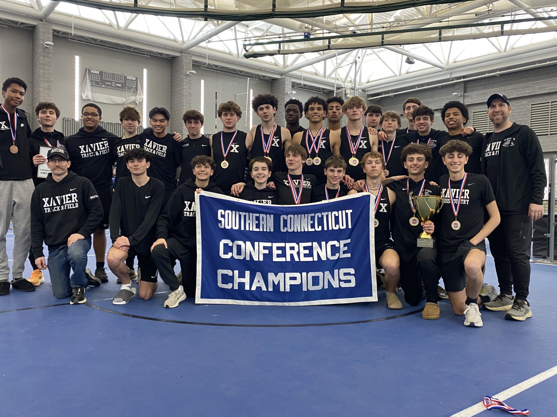 Xavier boys, Mercy girls capture SCC indoor track and field titles