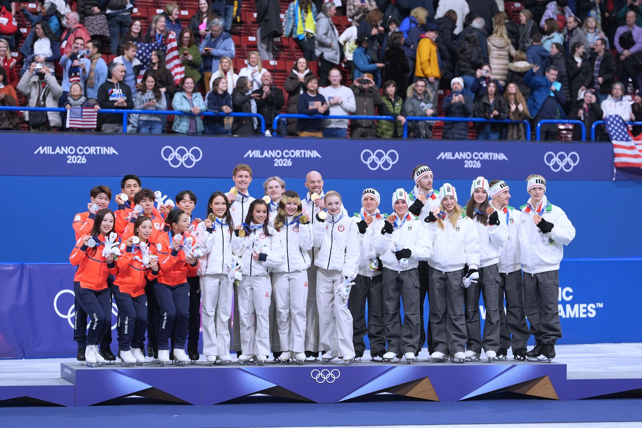 Milan Cortina Olympics apologizes for podium surface damaging skaters ...
