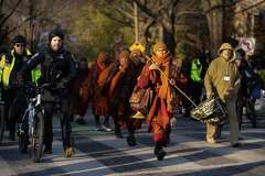 Buddhist monks' 15-week walk for peace ends in Washington, DC