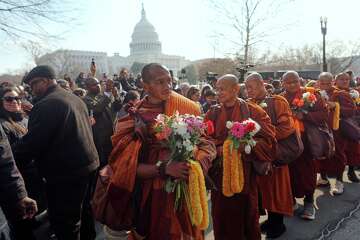 Photos of monks and rescue dog as they finish cross-country peace walk ...