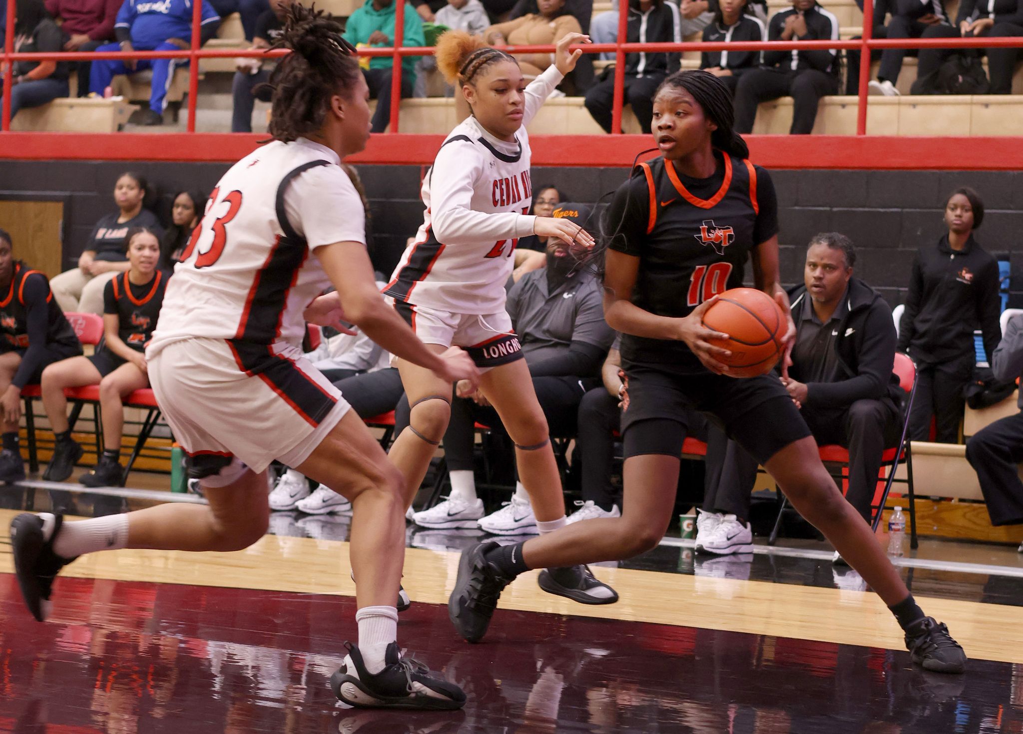 High school basketball: Late heroics lift Carter over rival Kimball