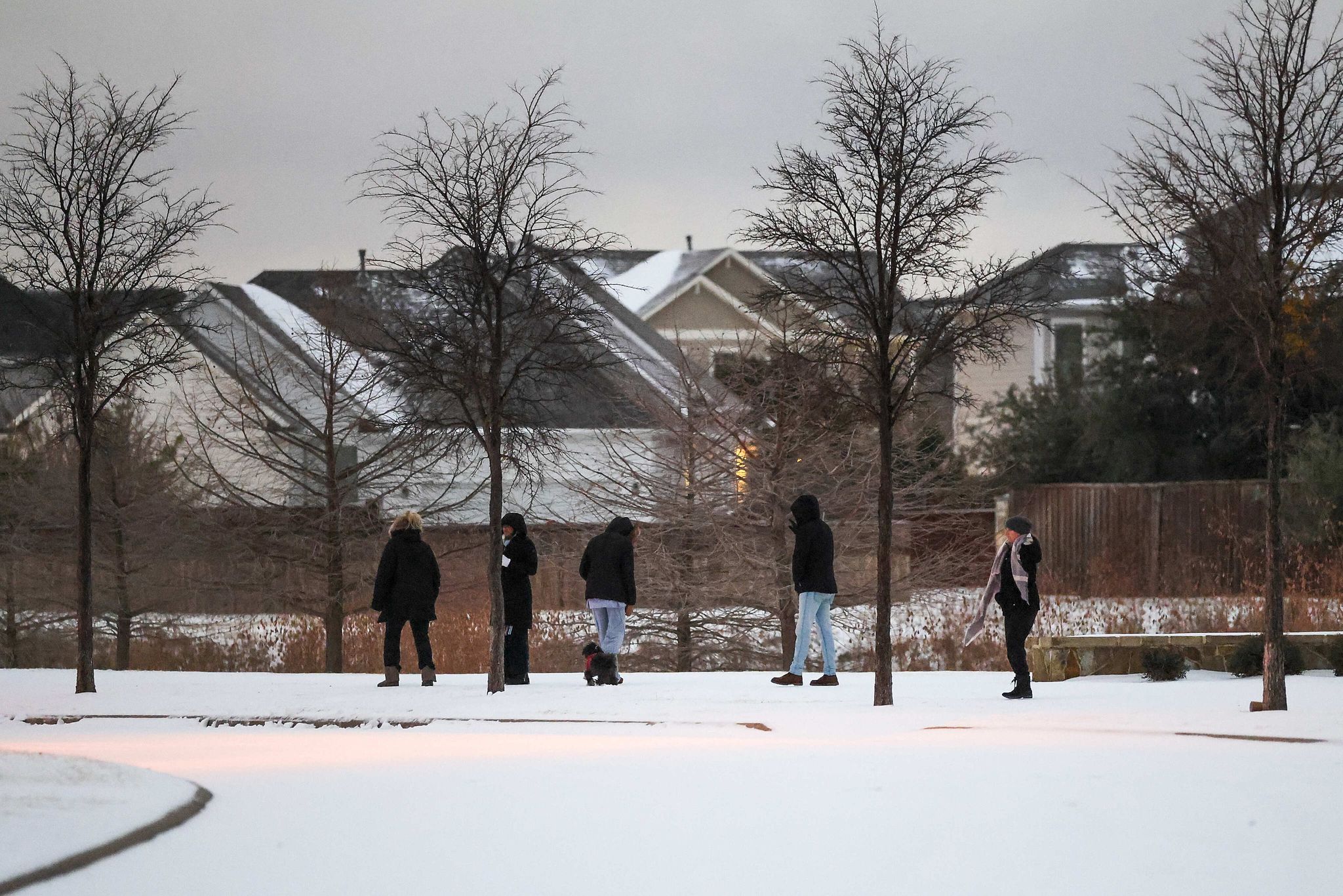 North Texas wakes Sunday to snow, icy roads, outages