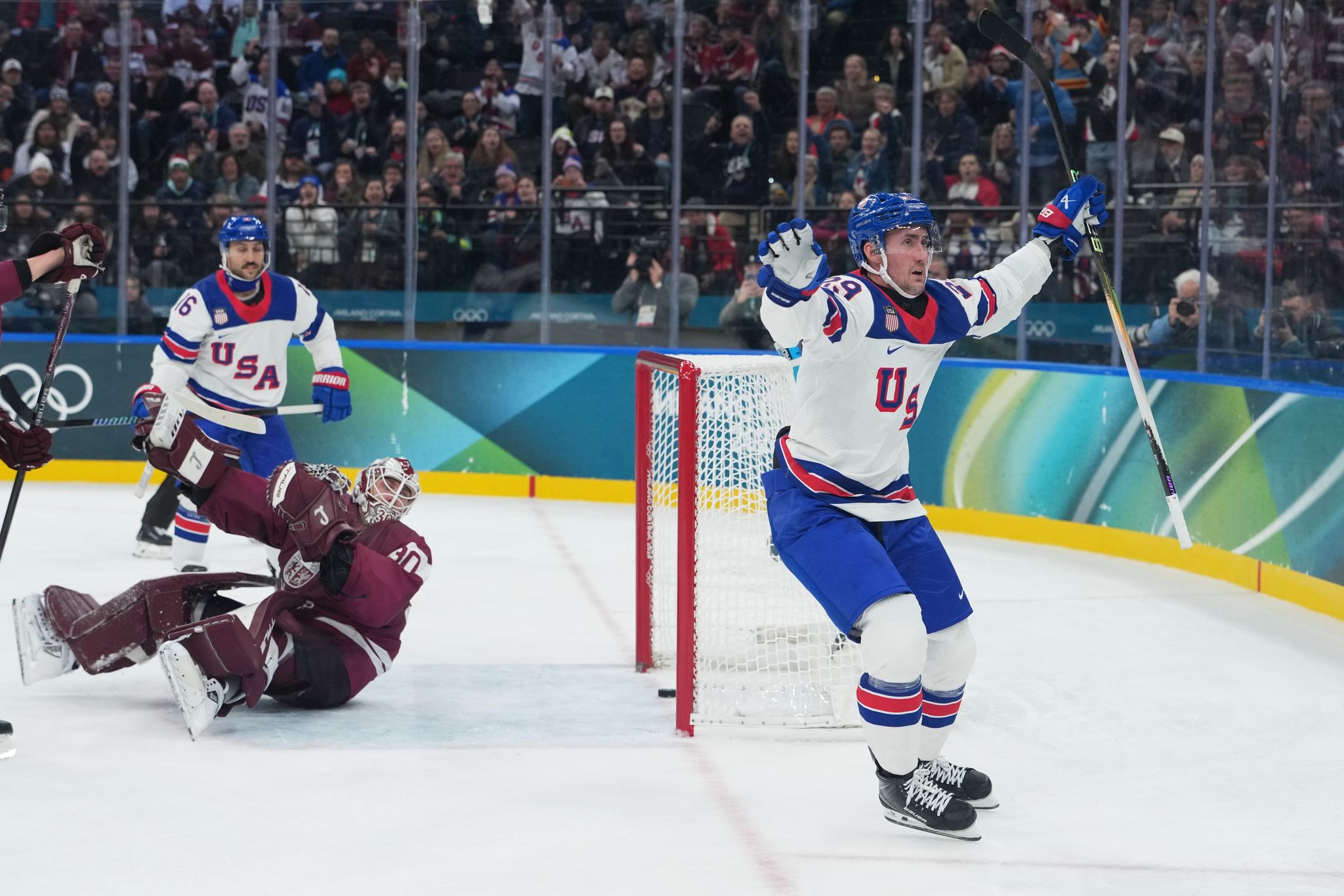 Brock Nelson scores twice as US opens Olympics with win over Latvia