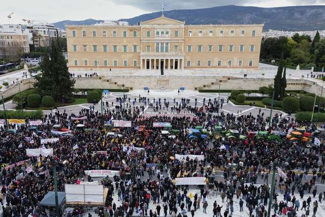 Angry Greek farmers converge on parliament with tractors in overnight ...