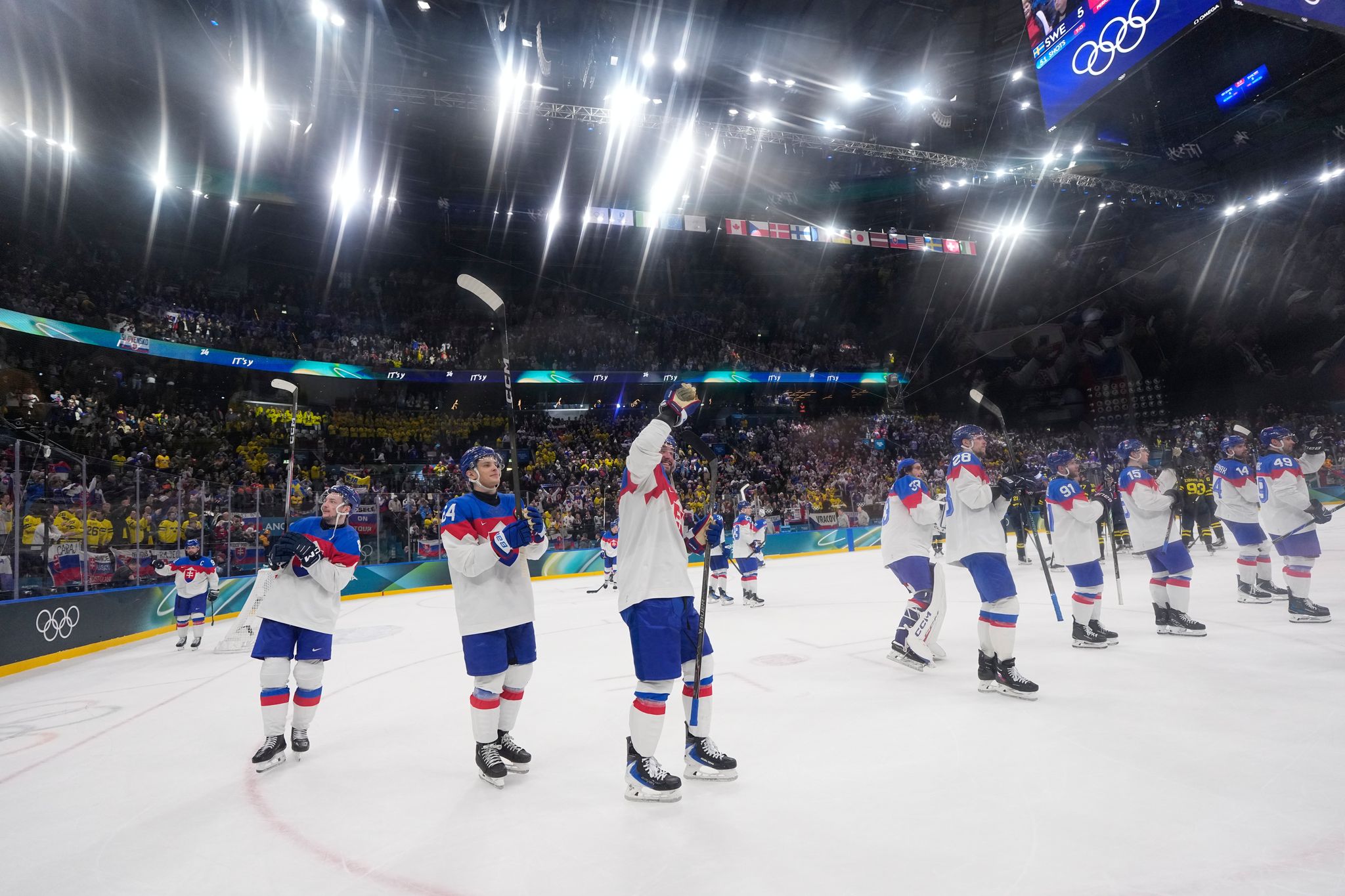 Slovakia celebrated after losing a hockey game at the Olympics 5-3 to ...