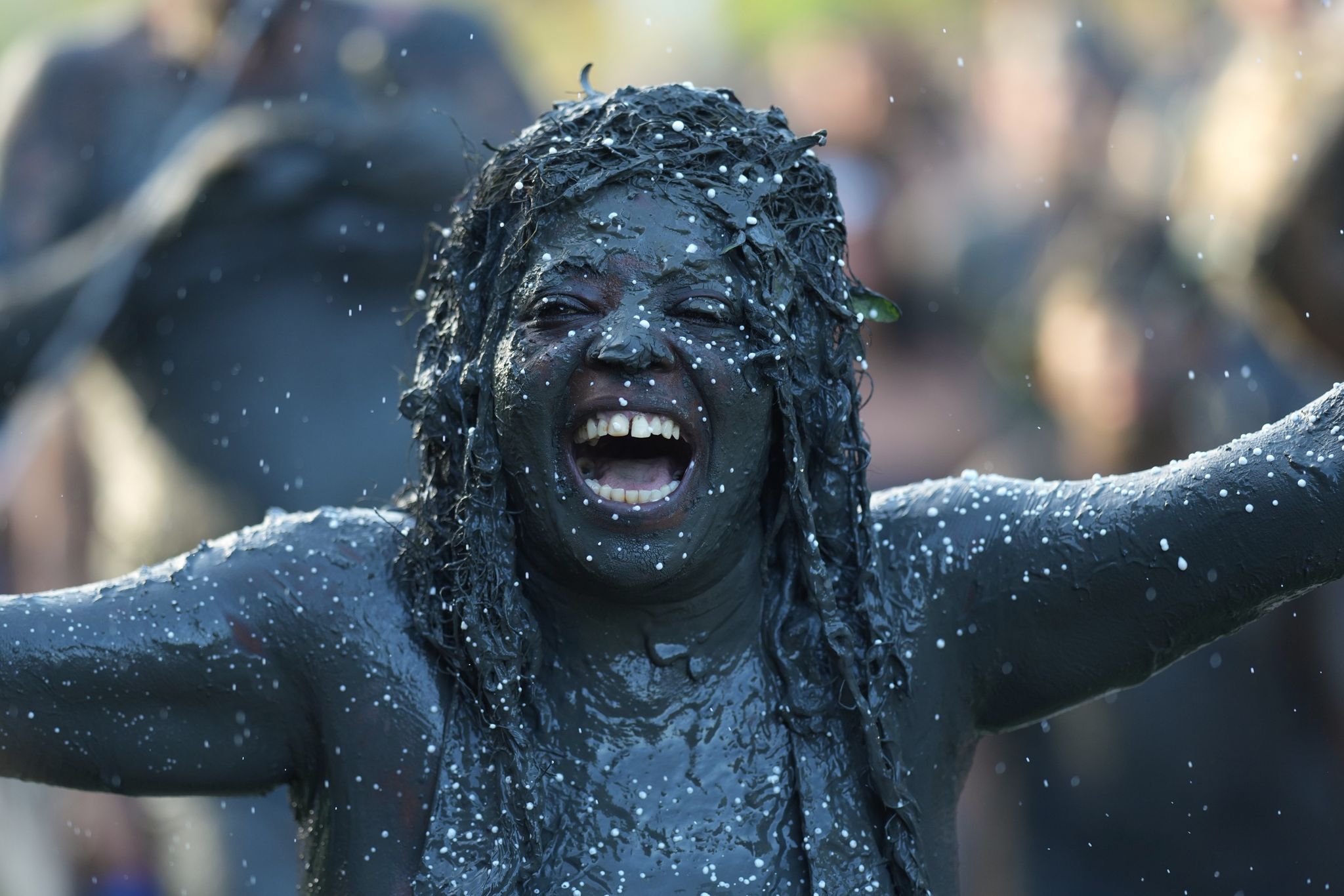 Forget glitter, this Carnival party in southern Brazil is all about mud