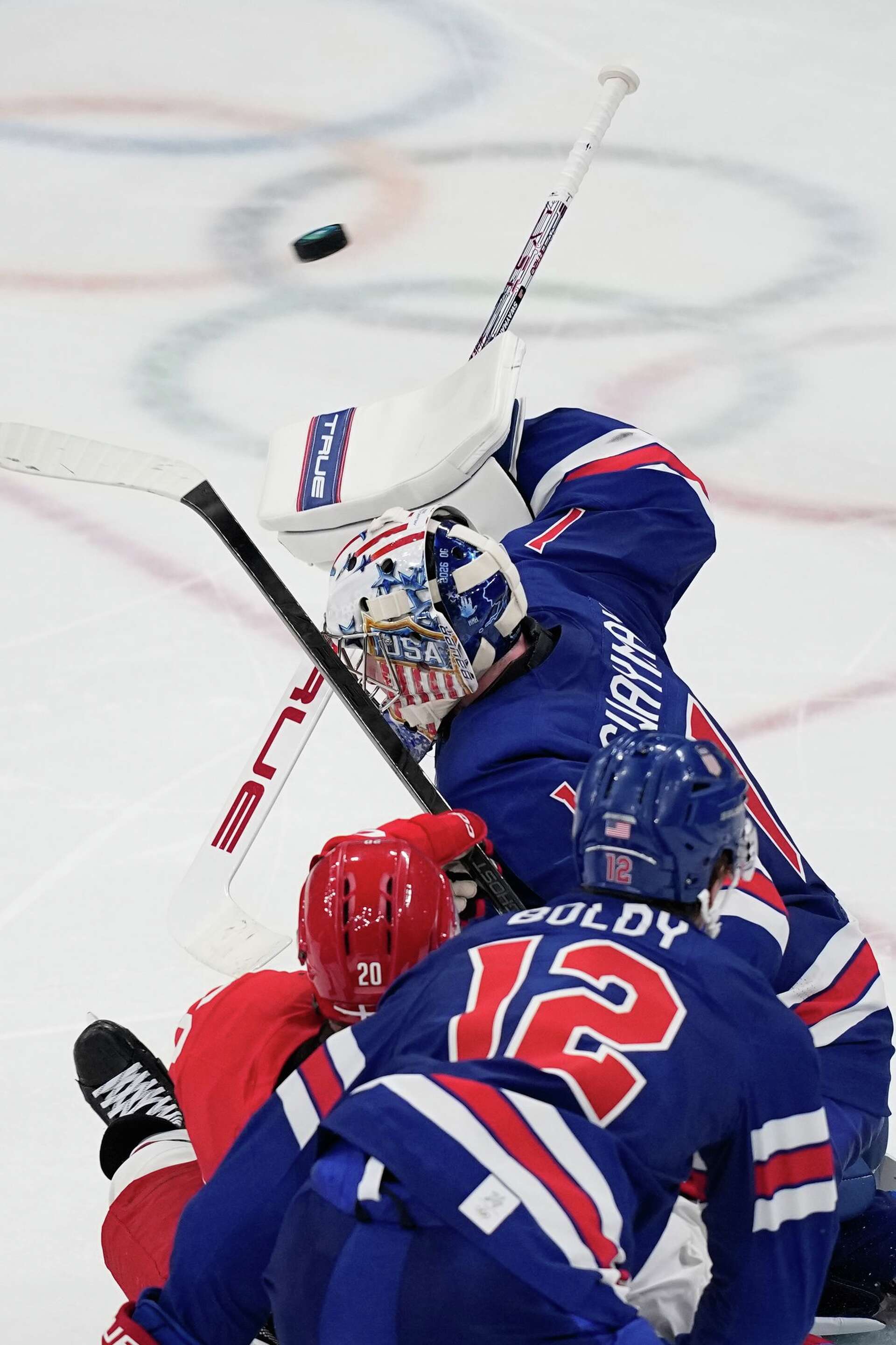 American Jeremy Swayman allows a long-distance goal against Denmark at ...